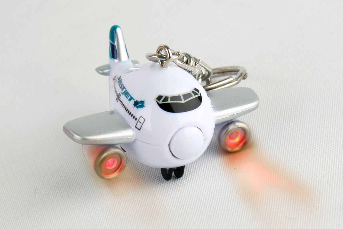 WESTJET AIRPLANE KEYCHAIN W/LIGHT & SOUND – Airline Employee Shop